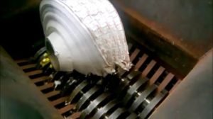 Shredder for adhesive stickers and plastic film - SASCO